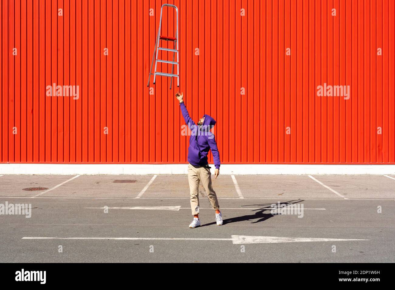 Red wall ladder hi-res stock photography and images - Alamy