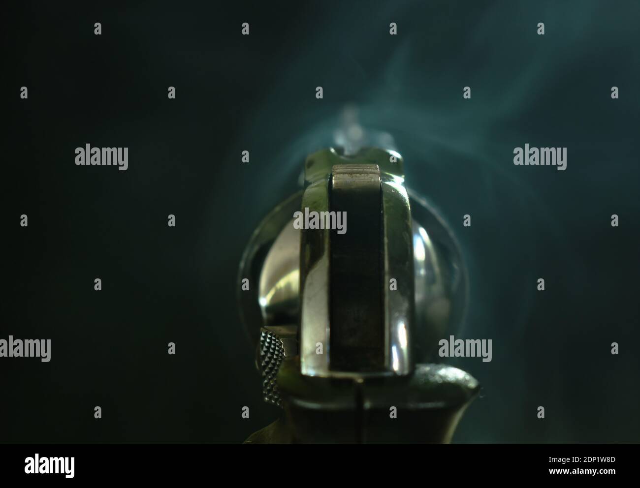 revolver gun with smoke floating in the air after shoot on black ...