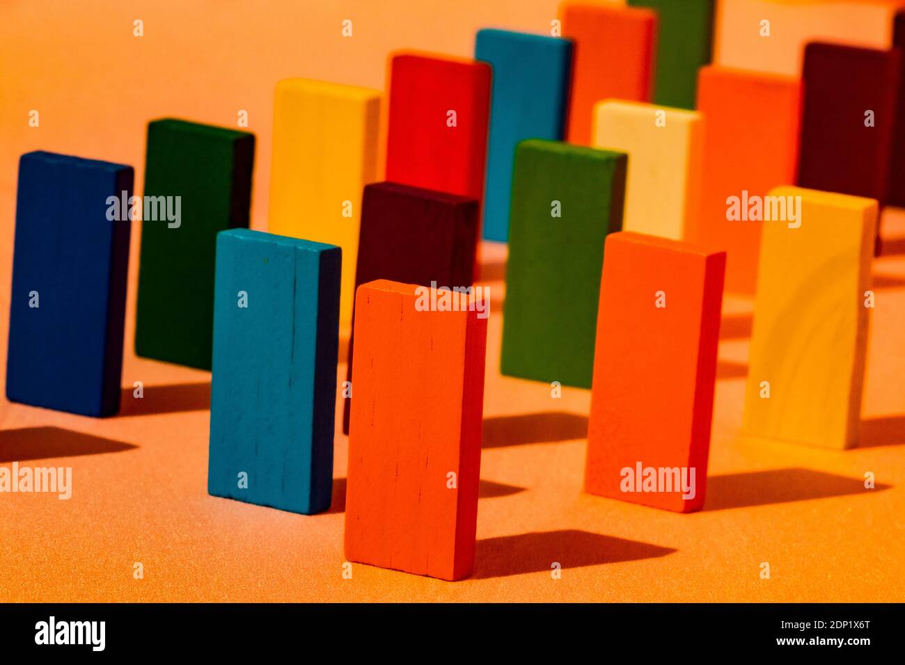 Close-up of rectangular blocks in a line on orange background Stock ...