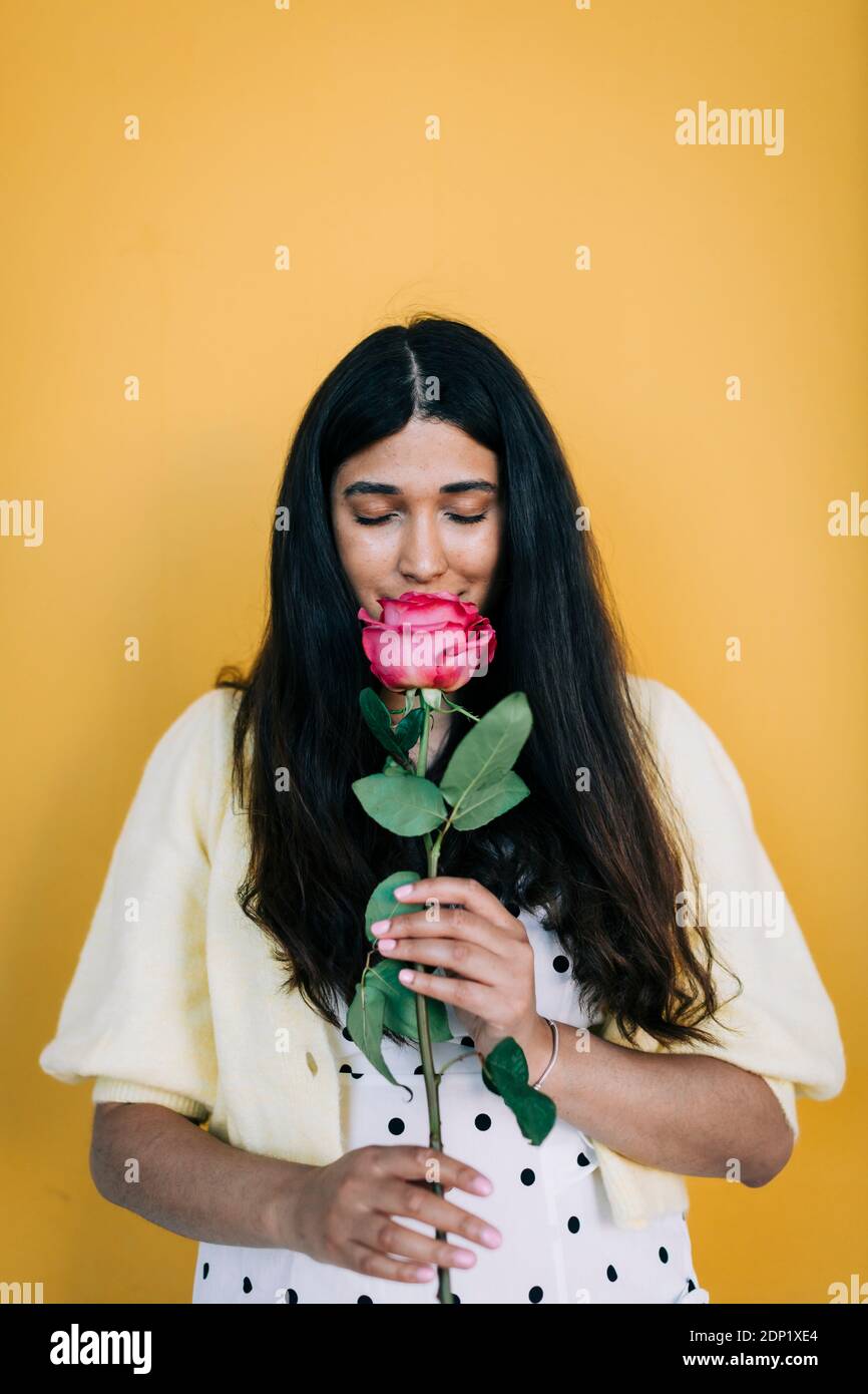 Smelling rose woman hi-res stock photography and images - Alamy