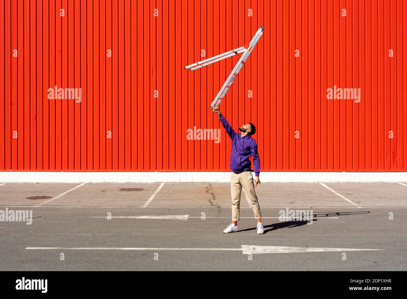 Acrobat standing ladder hi-res stock photography and images - Alamy