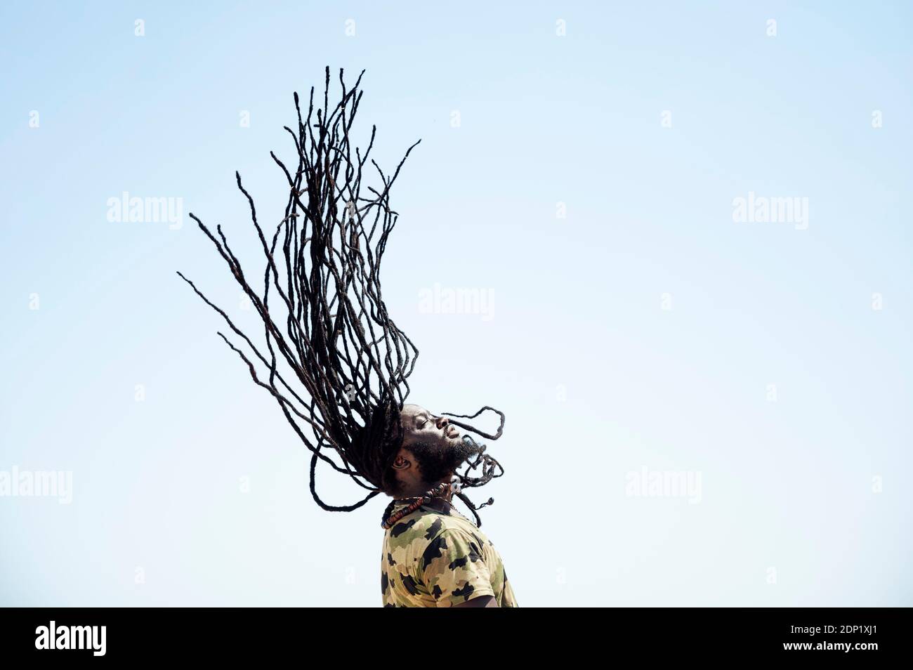 Black man with dreadlocks hi-res stock photography and images - Alamy