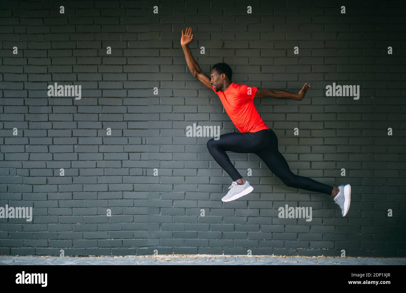 Brick wall with runner in front hi-res stock photography and images - Alamy