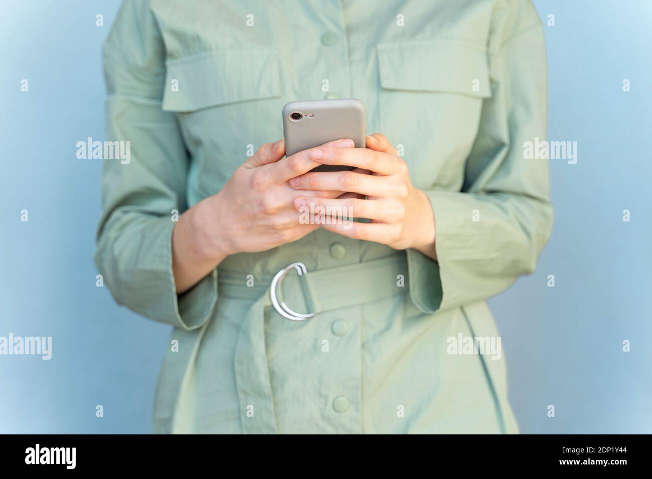 Close up cell phone hand blue hi-res stock photography and images - Alamy