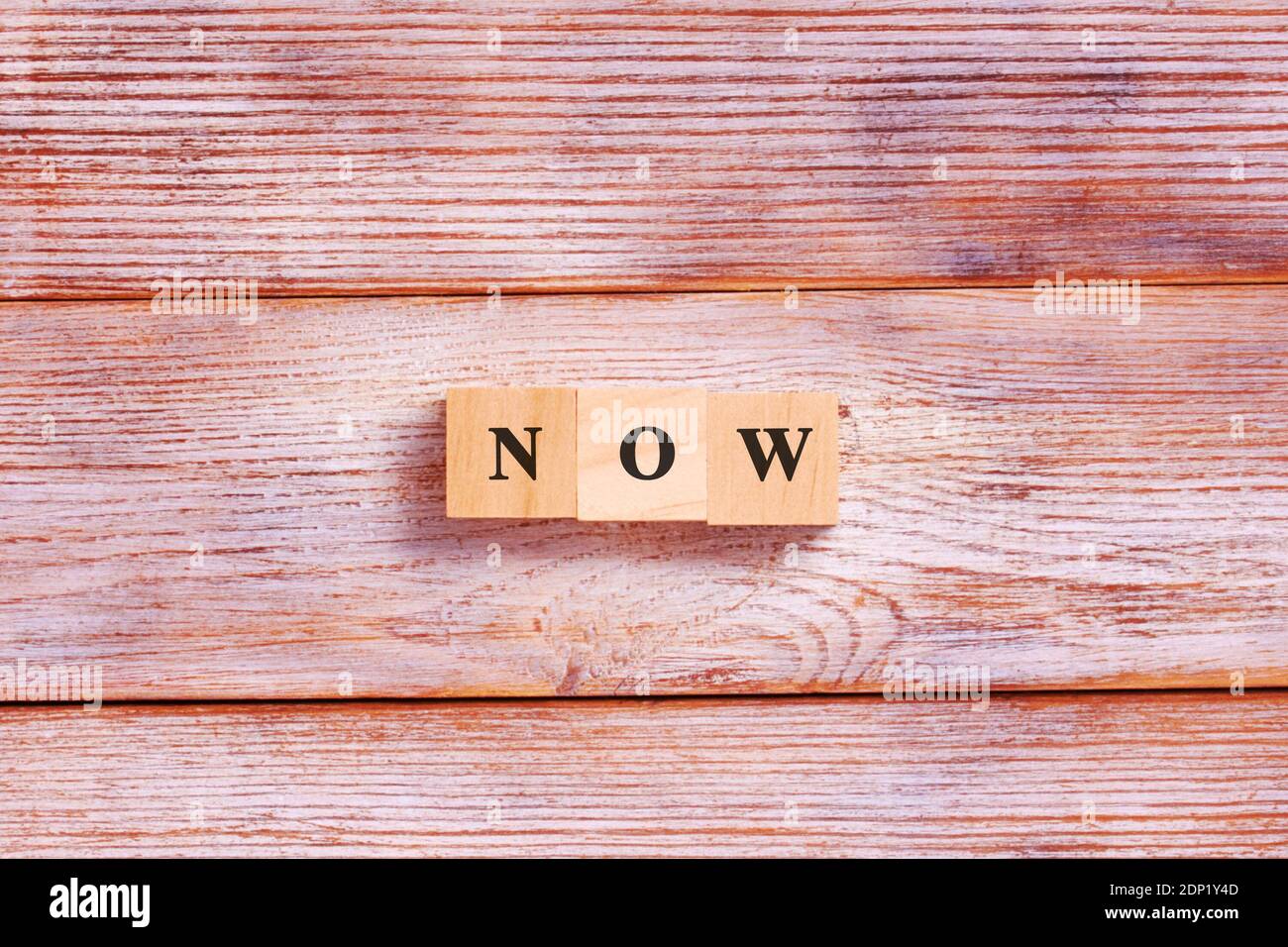 Wooden block cube for Now wording on white background. Concept of time ...