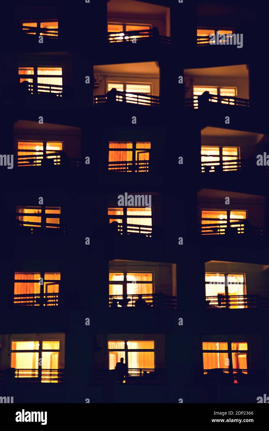 illuminated windows of a house at night Stock Photo - Alamy