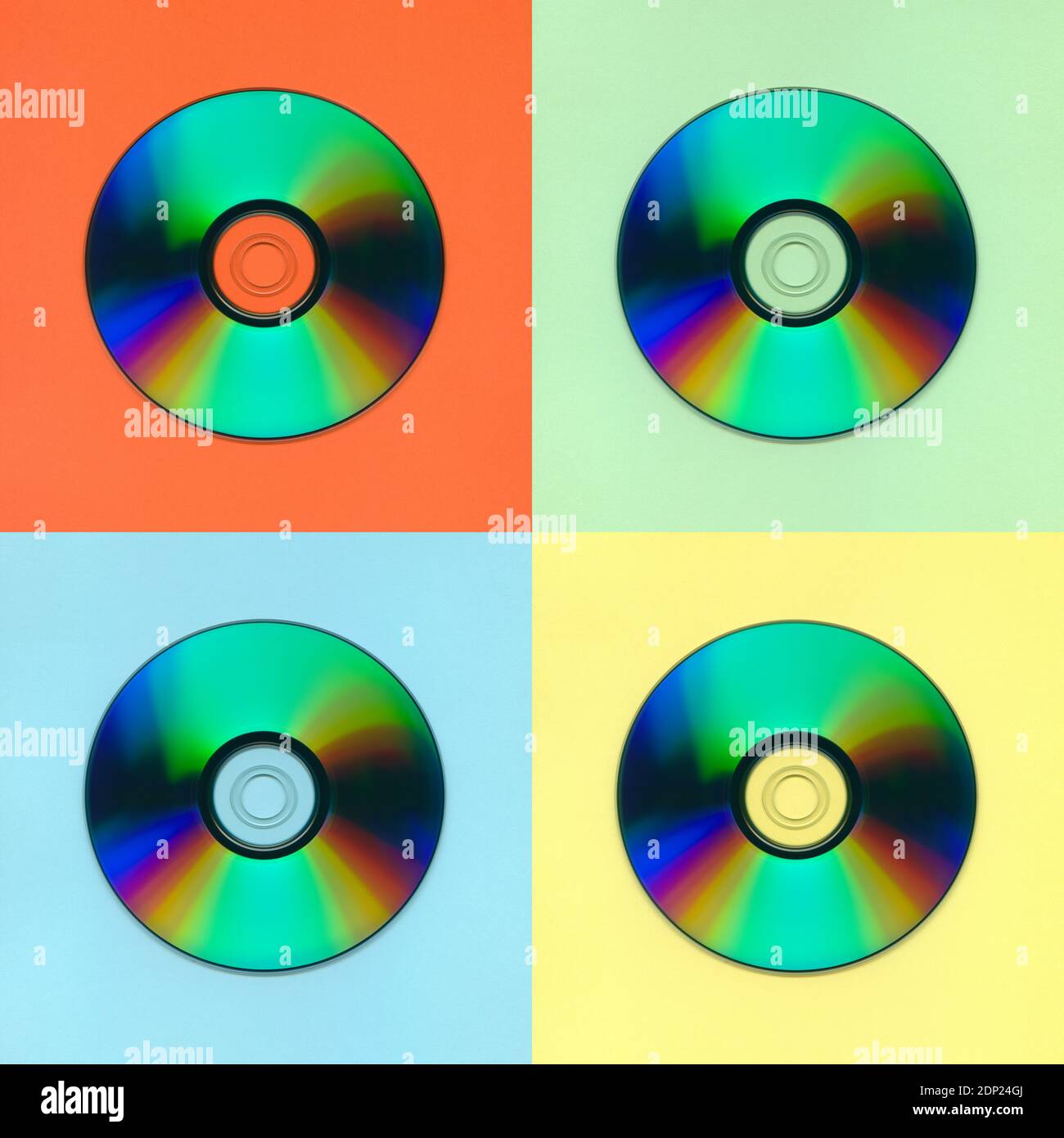 compact disks on a color background Stock Photo - Alamy