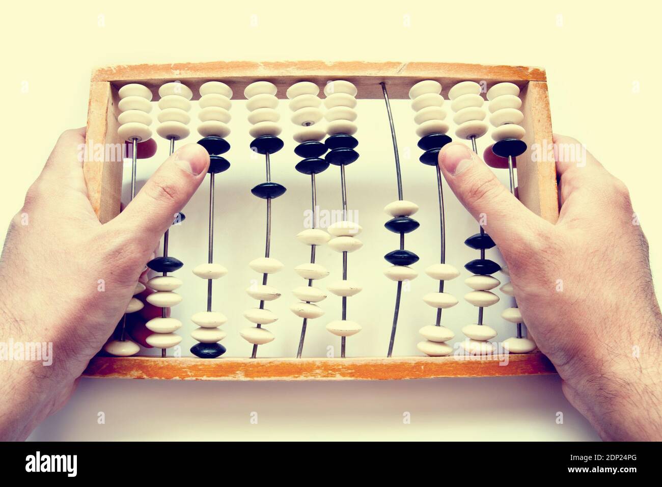old abacus with human hand Stock Photo - Alamy