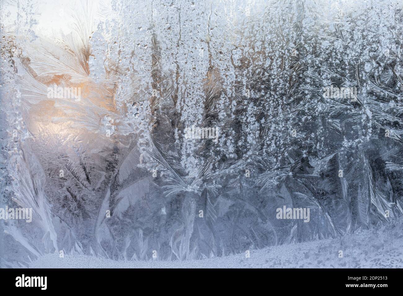 Frost pattern on the window. Beautiful frosty drawing. Abstract winter ...