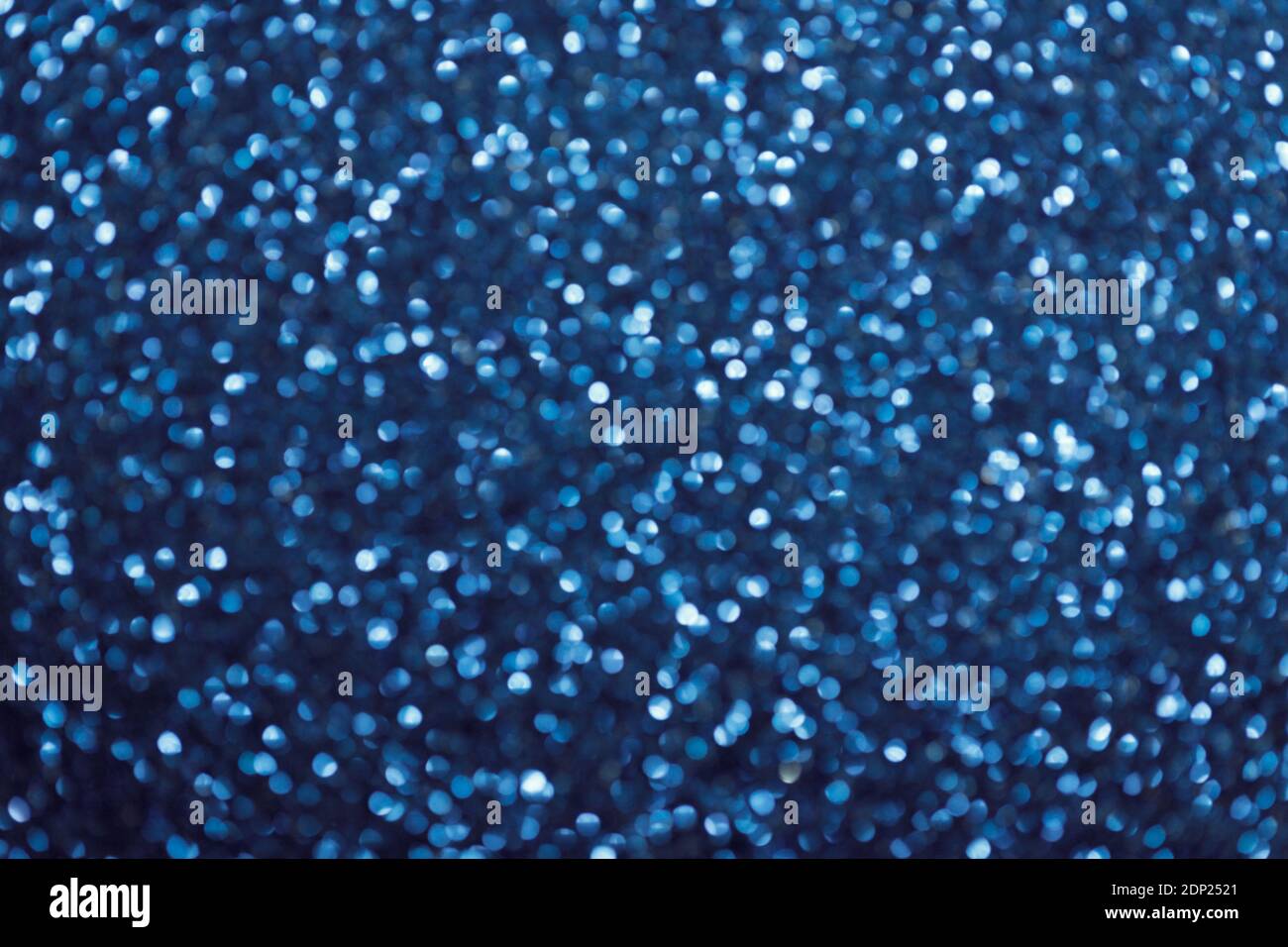 Shining blue bokeh background. Defocused glitter texture. Holiday ...