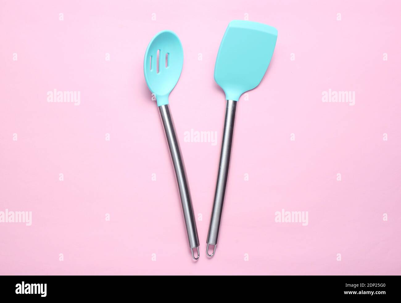 Silicone paddles for cooking on pink background. Top view Stock Photo ...