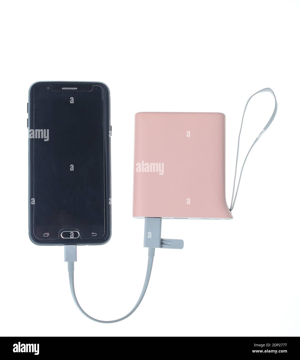 Modern smartphone charging from power bank isolated on white background ...