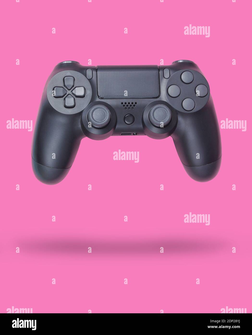 Gamepads on pink pastel paper background. Top view. Minimalism Stock ...