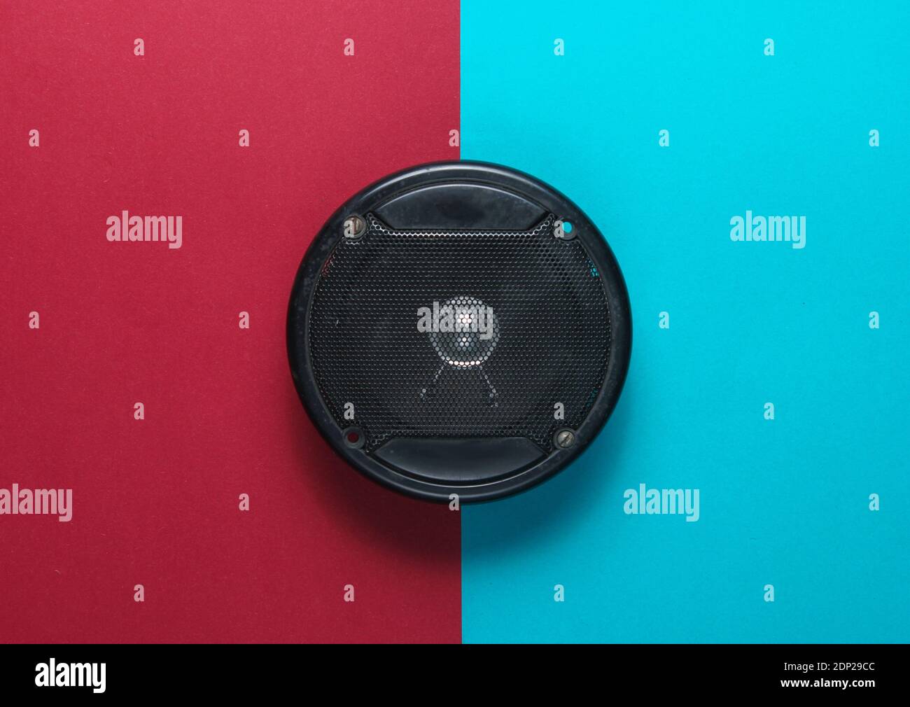 Audio speaker on a red-blue background. Top view Stock Photo - Alamy