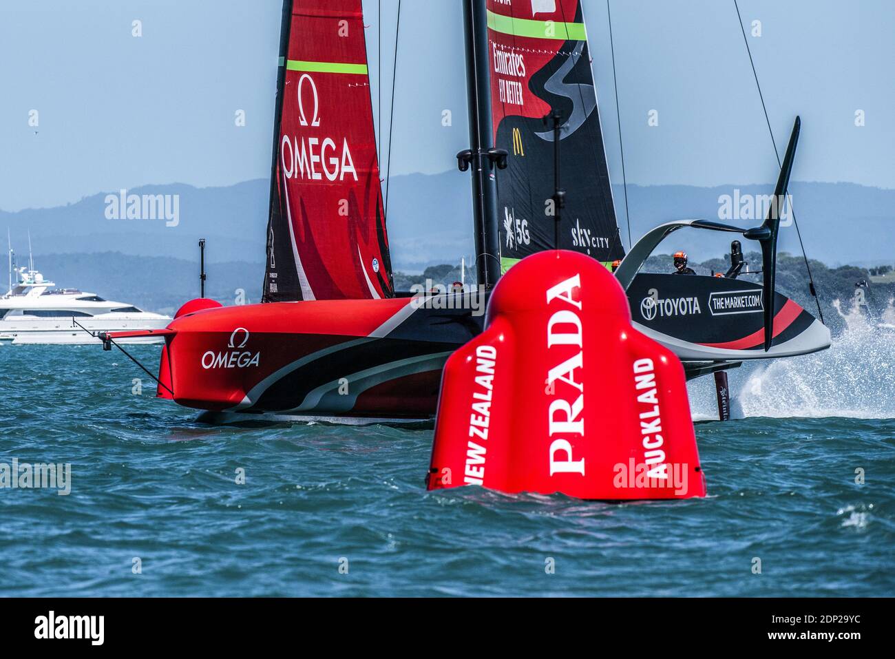 Emirates Team New Zealand foil across the finish line to win their match against Luna Rossa Prada Pirelli Team during the Prada America s Cup World Series Auckland Race Day One on december