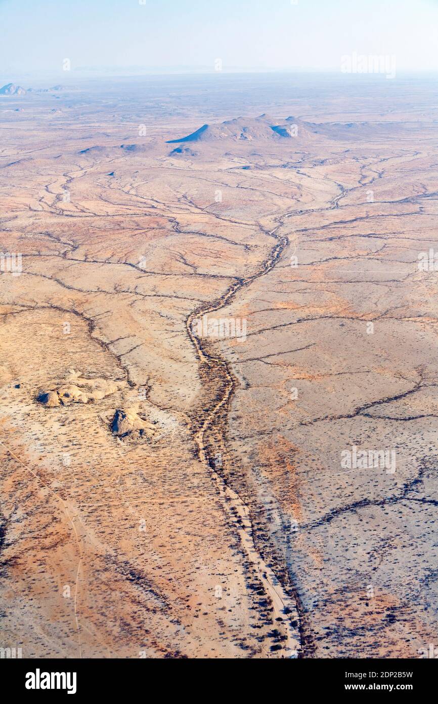 Dried up riverbed in the arid Namib Desert near the Skeleton Coast in ...