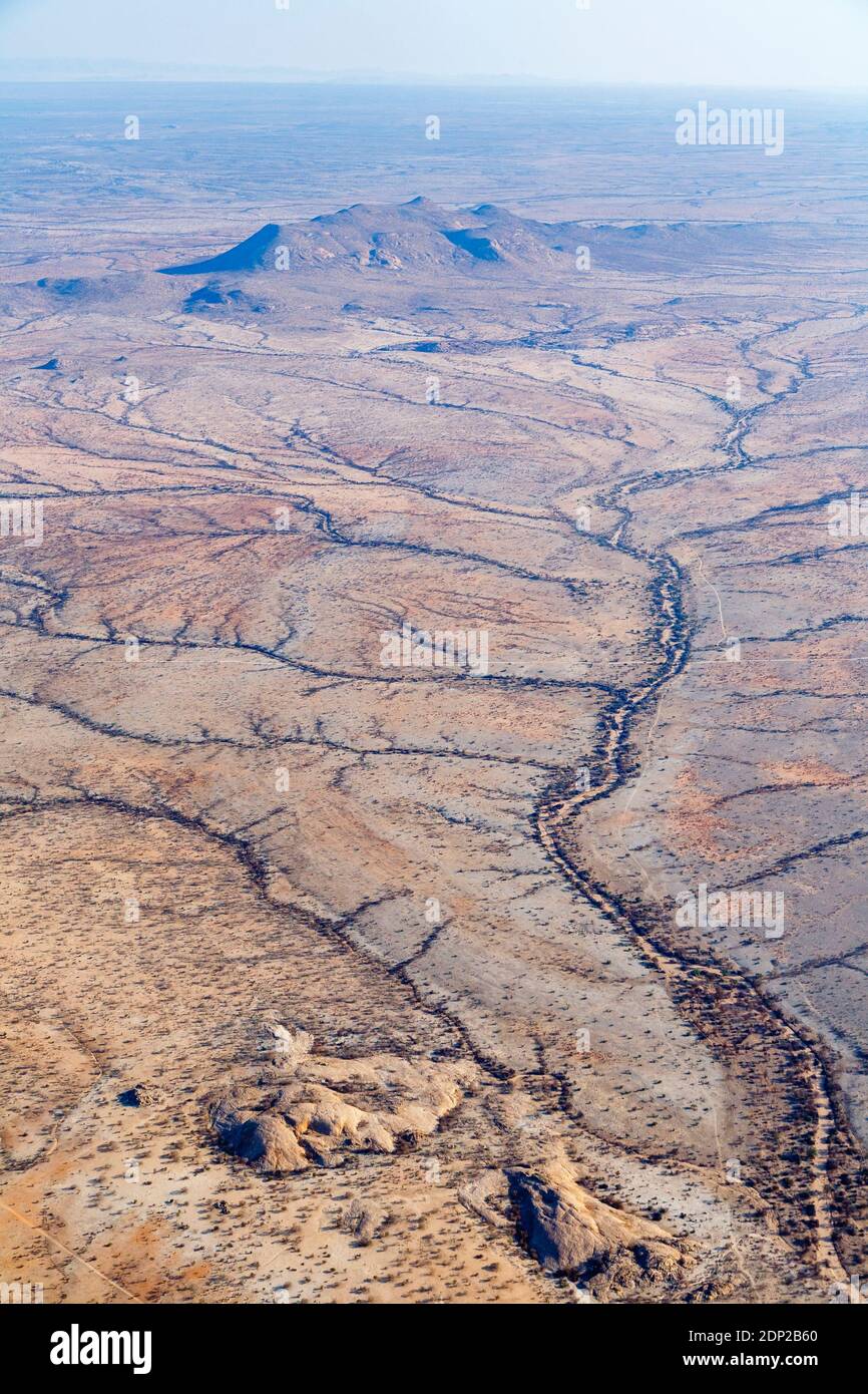Dried up riverbed in the arid Namib Desert near the Skeleton Coast in ...