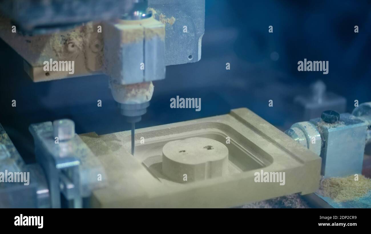 CNC engraving milling machine during work Stock Photo - Alamy