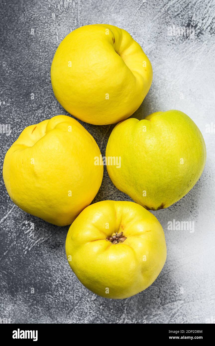 Fresh quince fruits on white table. White background. Top view Stock ...