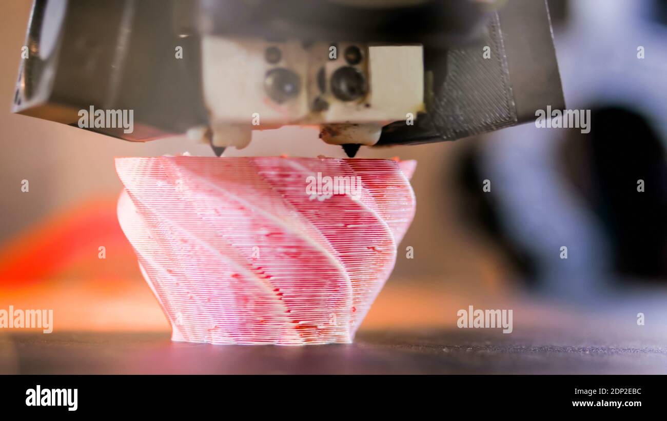 Three dimensional printing machine prints physical 3D model Stock Photo ...