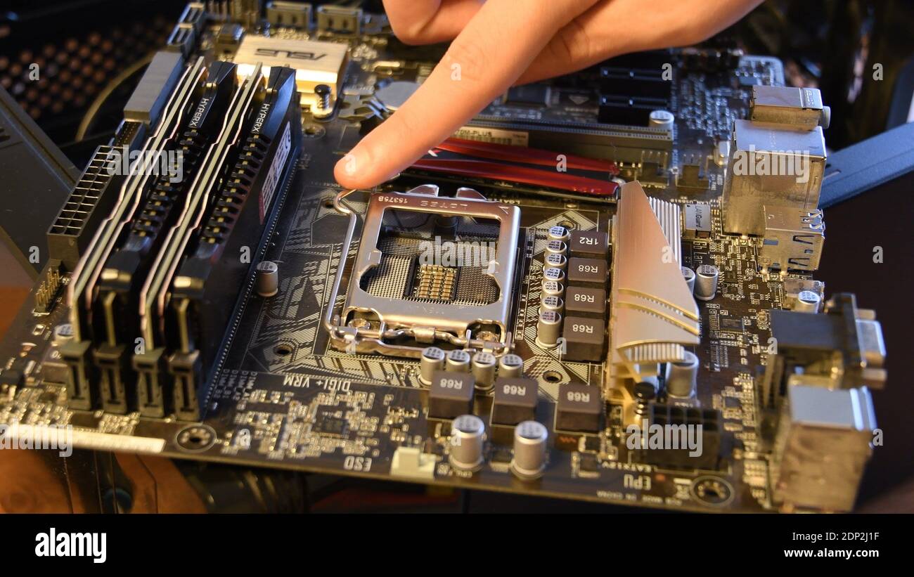 Closeup of modern PC motherboard hardware with empty space for CPU ...