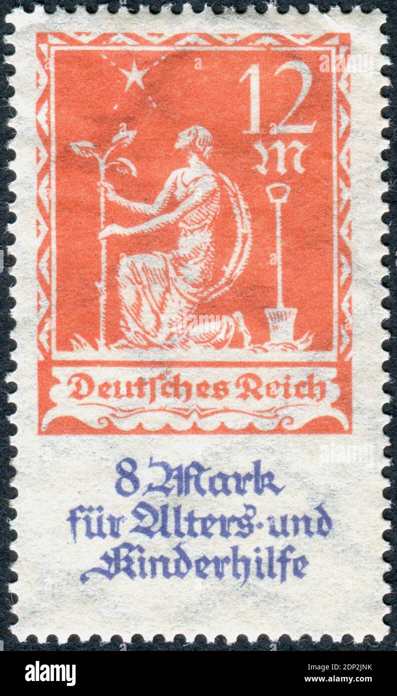GERMANY - CIRCA 1922: A postage stamp printed in Germany, shown a Girls ...