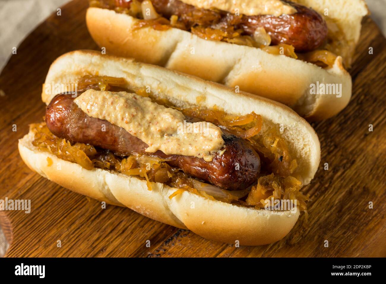 Homemade Bratwurst Sausage Sandwiches with Mustard and Sauerkraut Stock ...