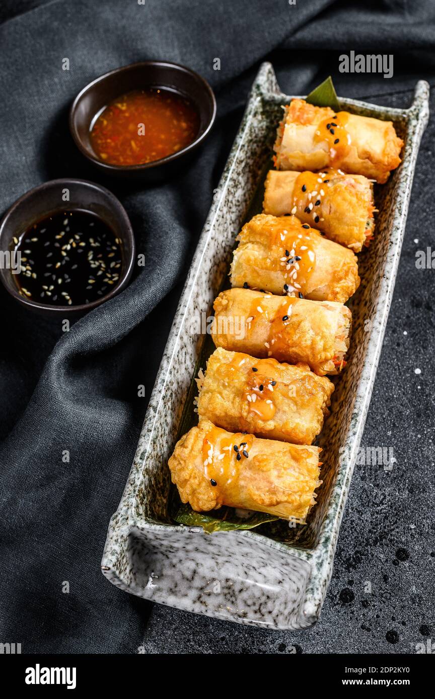 Traditional Chinese vegetable spring rolls. Vegetarian food. Black ...