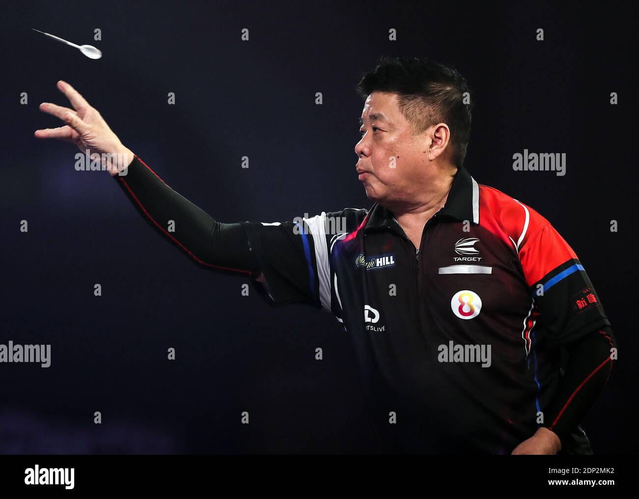 Paul Lim in action during day four of the William Hill World Darts ...