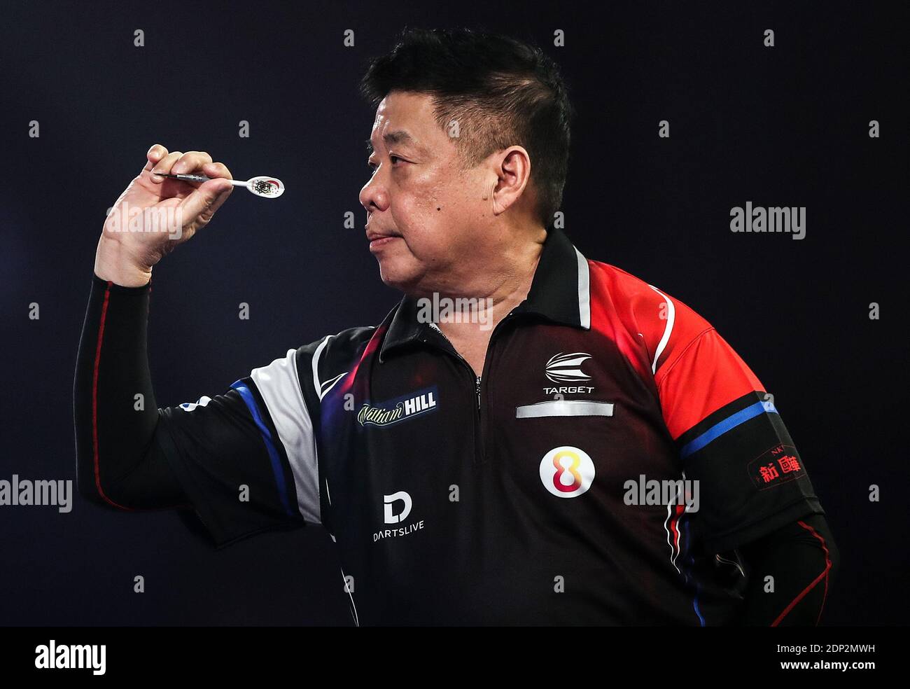 Paul Lim in action during day four of the William Hill World Darts ...