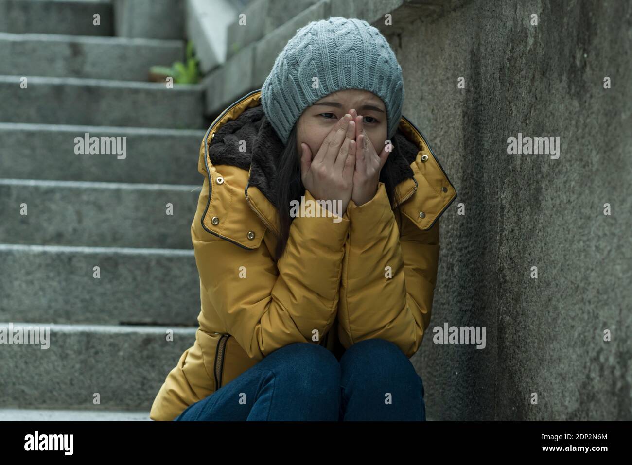 dramatic lifestyle portrait of young attractive sad and depressed ...