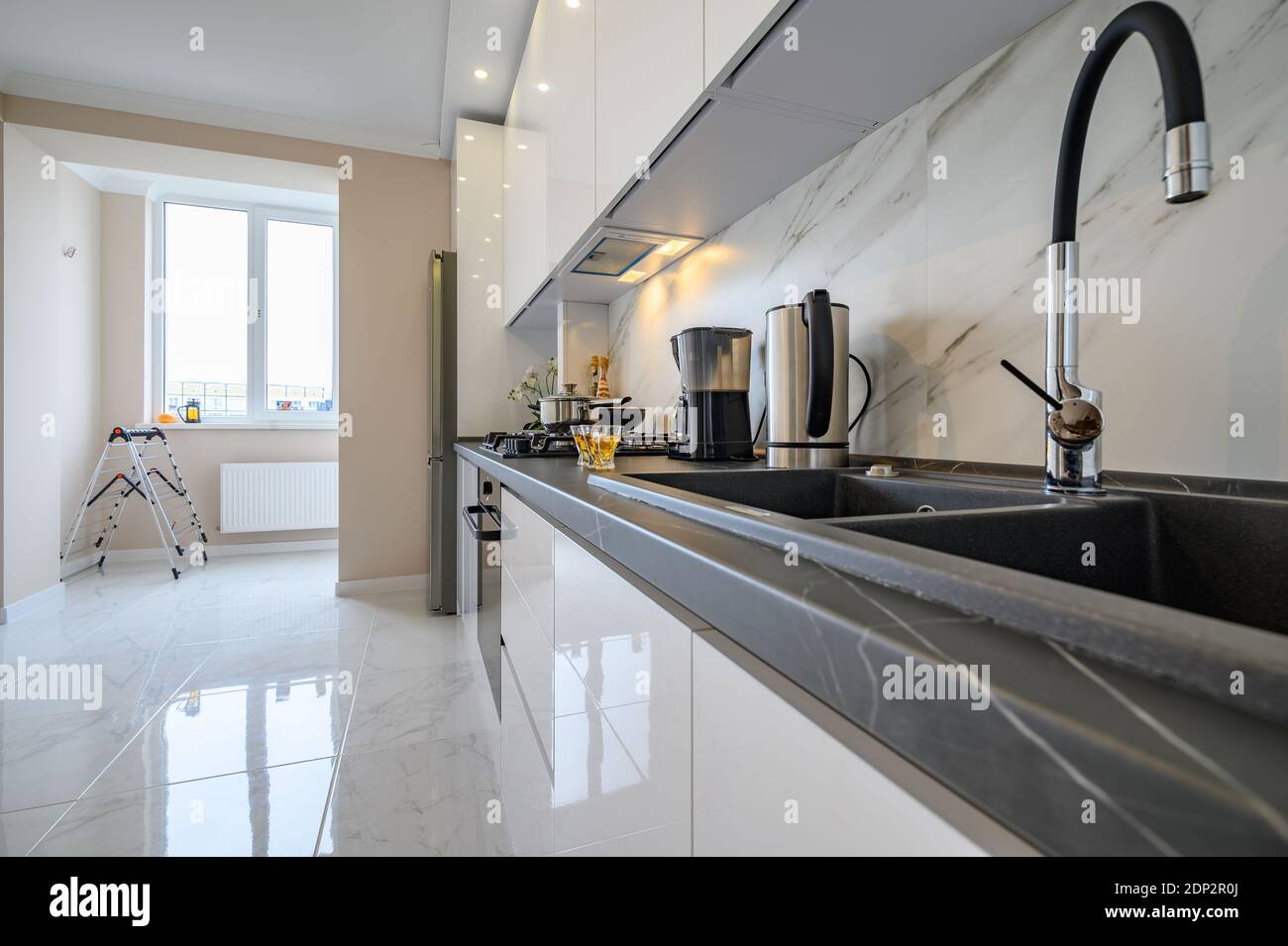 Closeup to modern kitchen cupboard Stock Photo - Alamy
