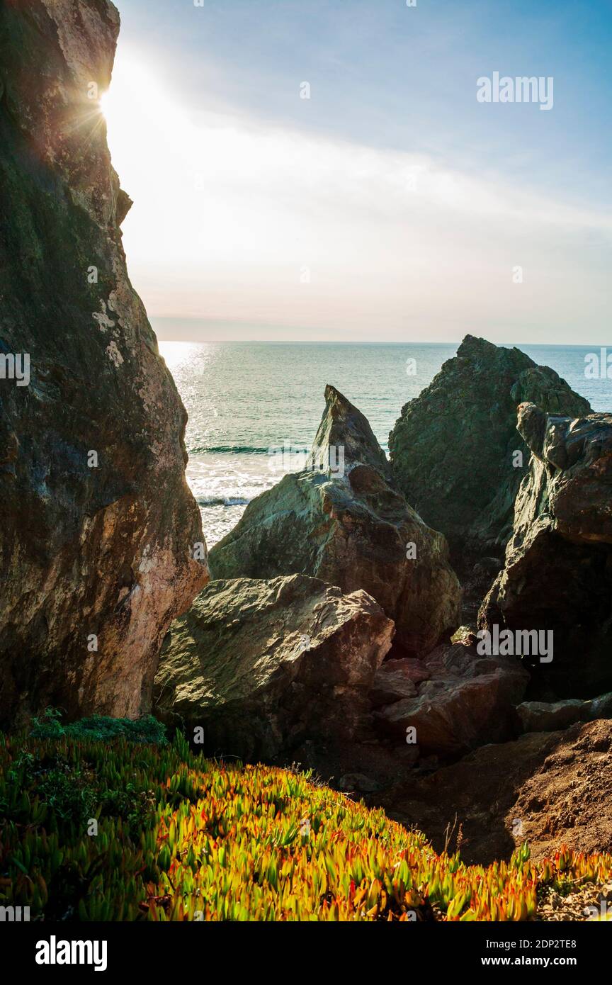 Overhead view down onto a northern California beach, waves reflecting ...