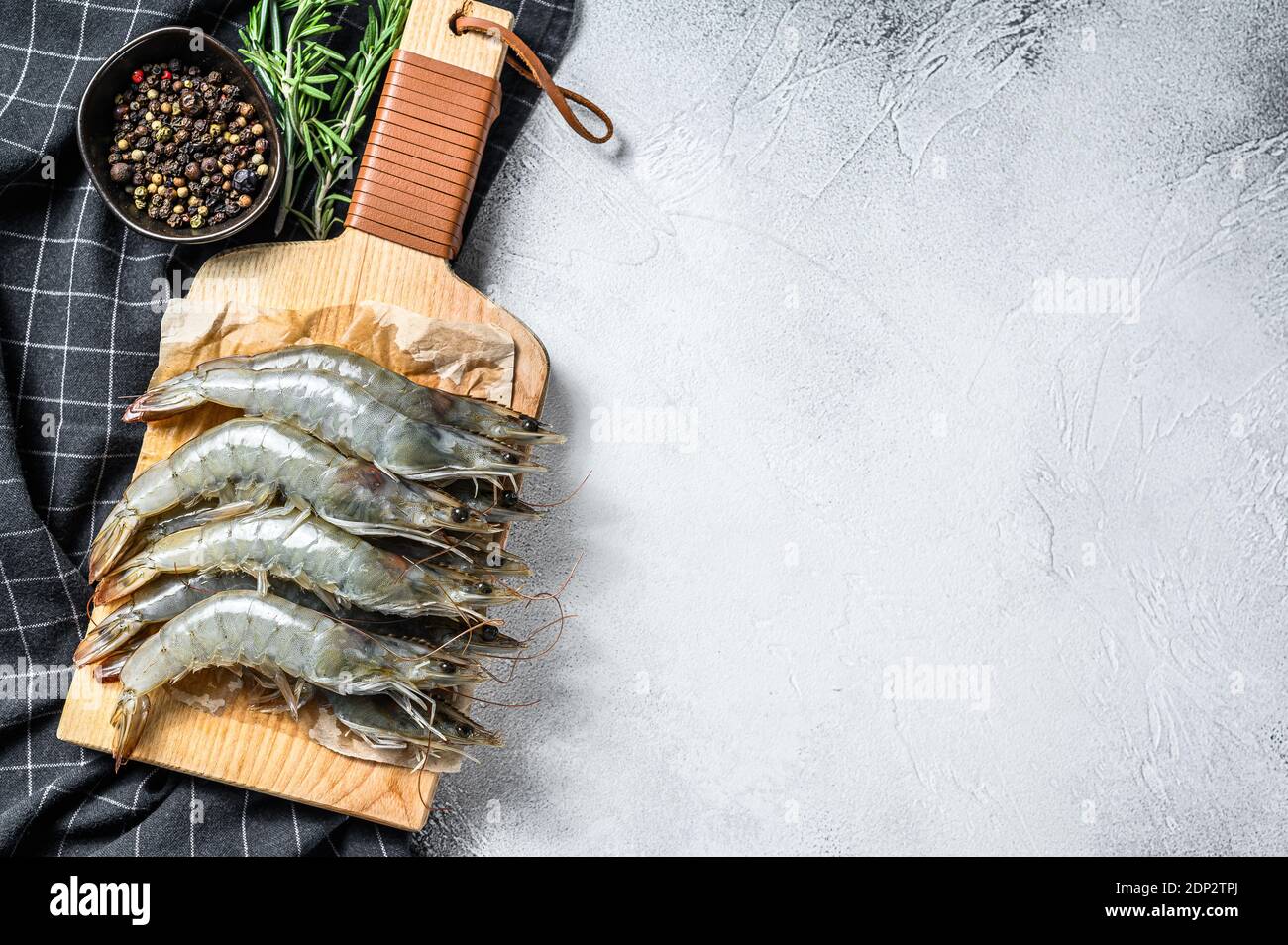 Fresh raw giant langoustine shrimp . Gray background. Top view. Copy ...