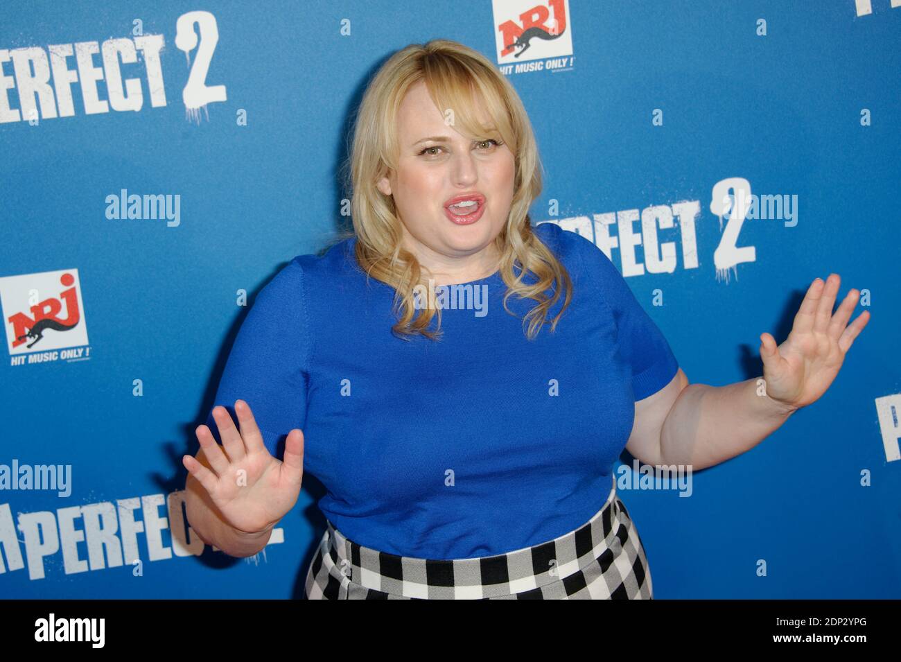Rebel Wilson poses for pictures as she arrives to the premiere of the ...