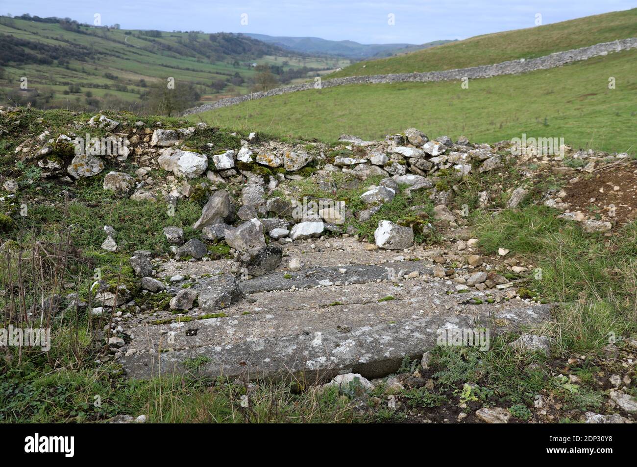 Capped lead mine in fields above the Dove Valley in Derbyshire Stock ...