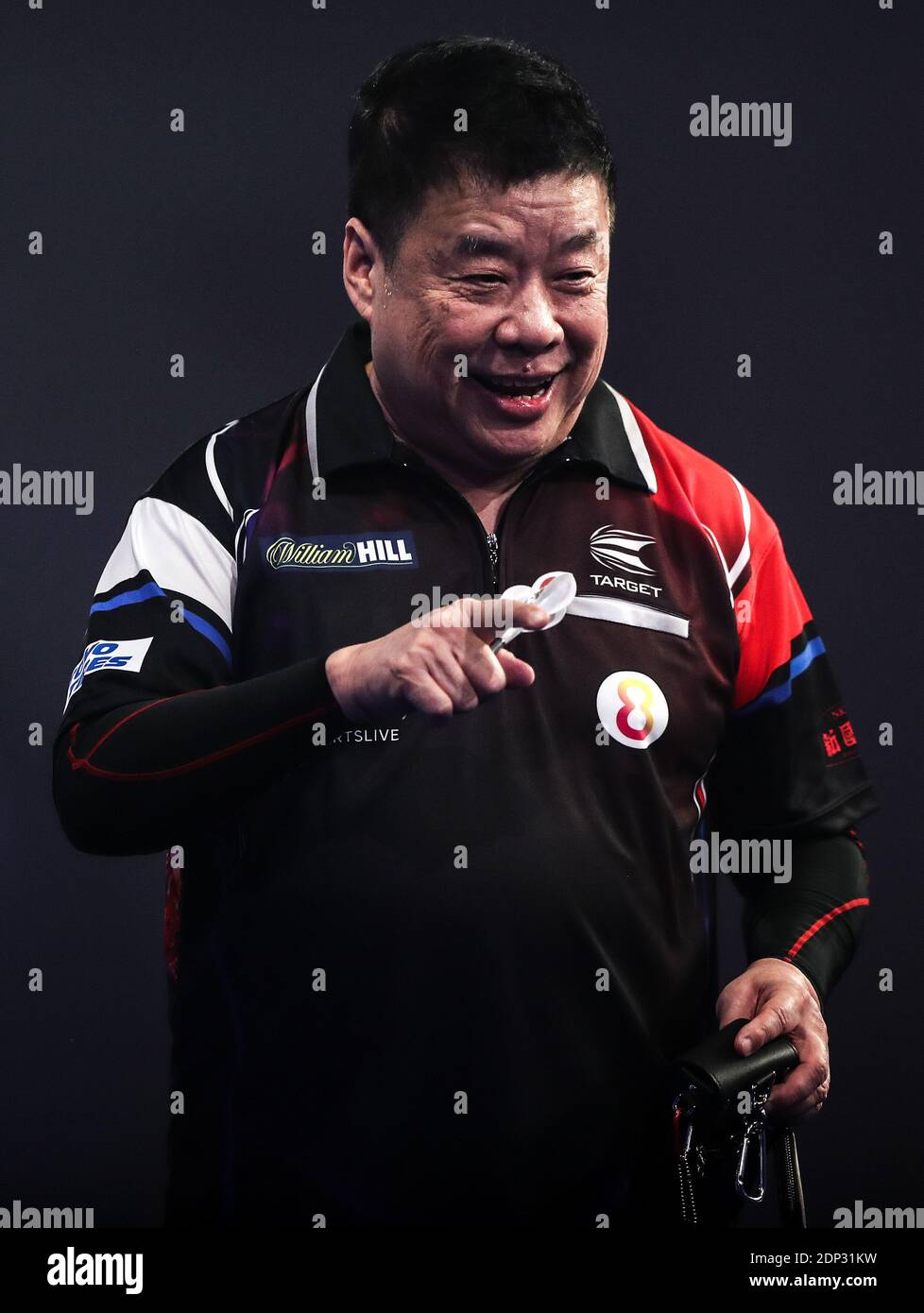 Paul Lim celebrates after winning his match against Luke Humphries ...