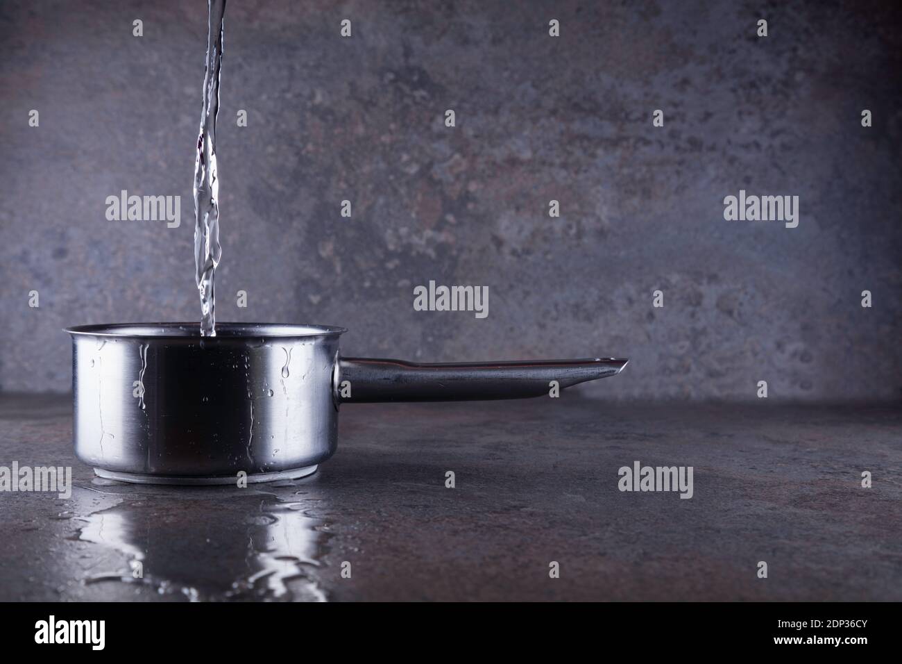 Saucepan filling with water hi-res stock photography and images - Alamy