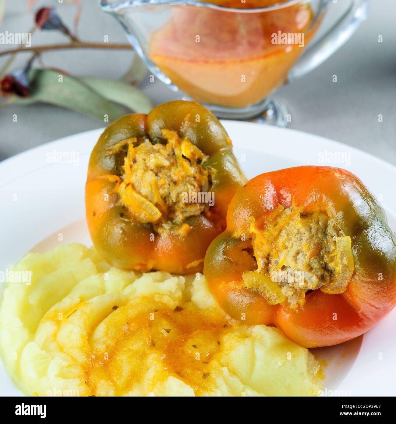 Sweet bell peppers stuffed with meat and vegetables,mashed potatoes and ...