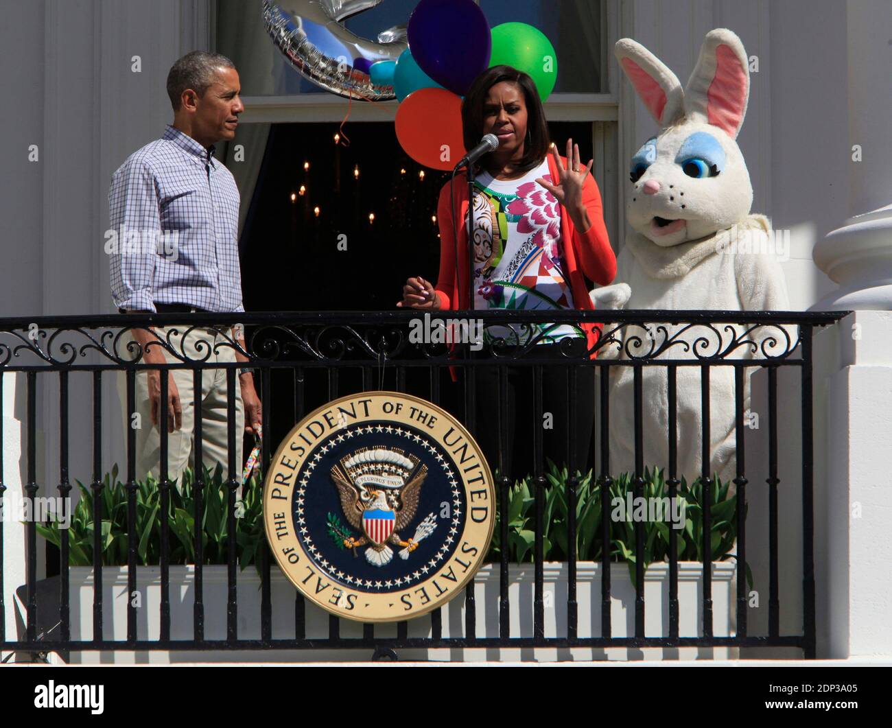 President Barack Obama and First Lady Michelle Obama participate in the ...