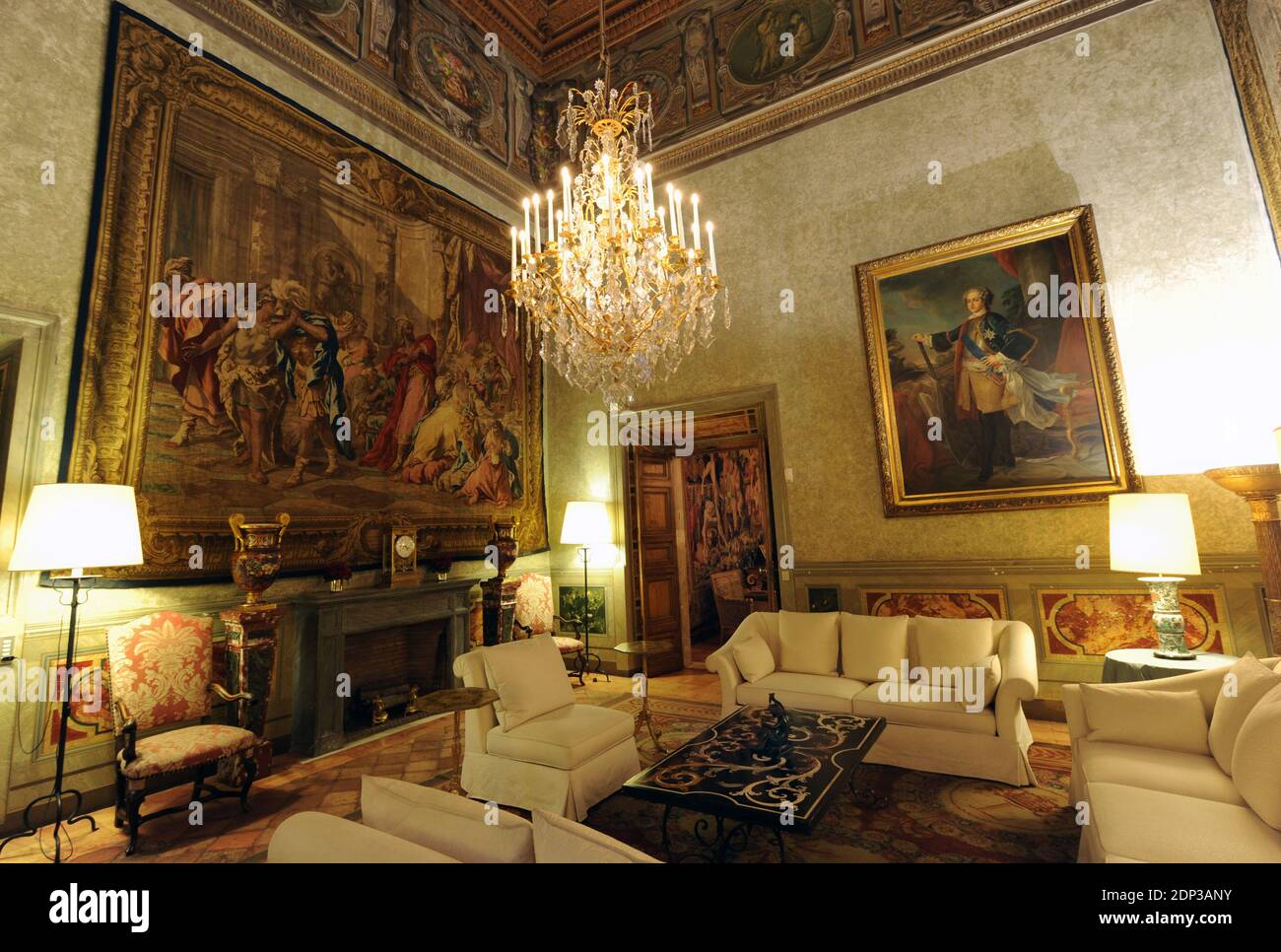 A view of the the yellow lounge with a copy of a painting of Louis XV ...