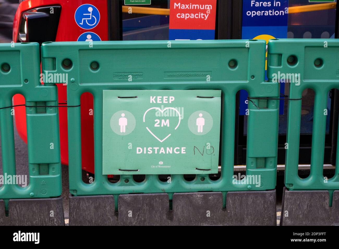 Covid 19 2 metre distance sign Stock Photo - Alamy