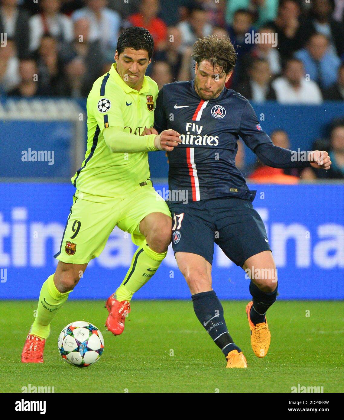 Barcelona's Luis Suarez and PSG's Maxwell during the UEFA Champions ...