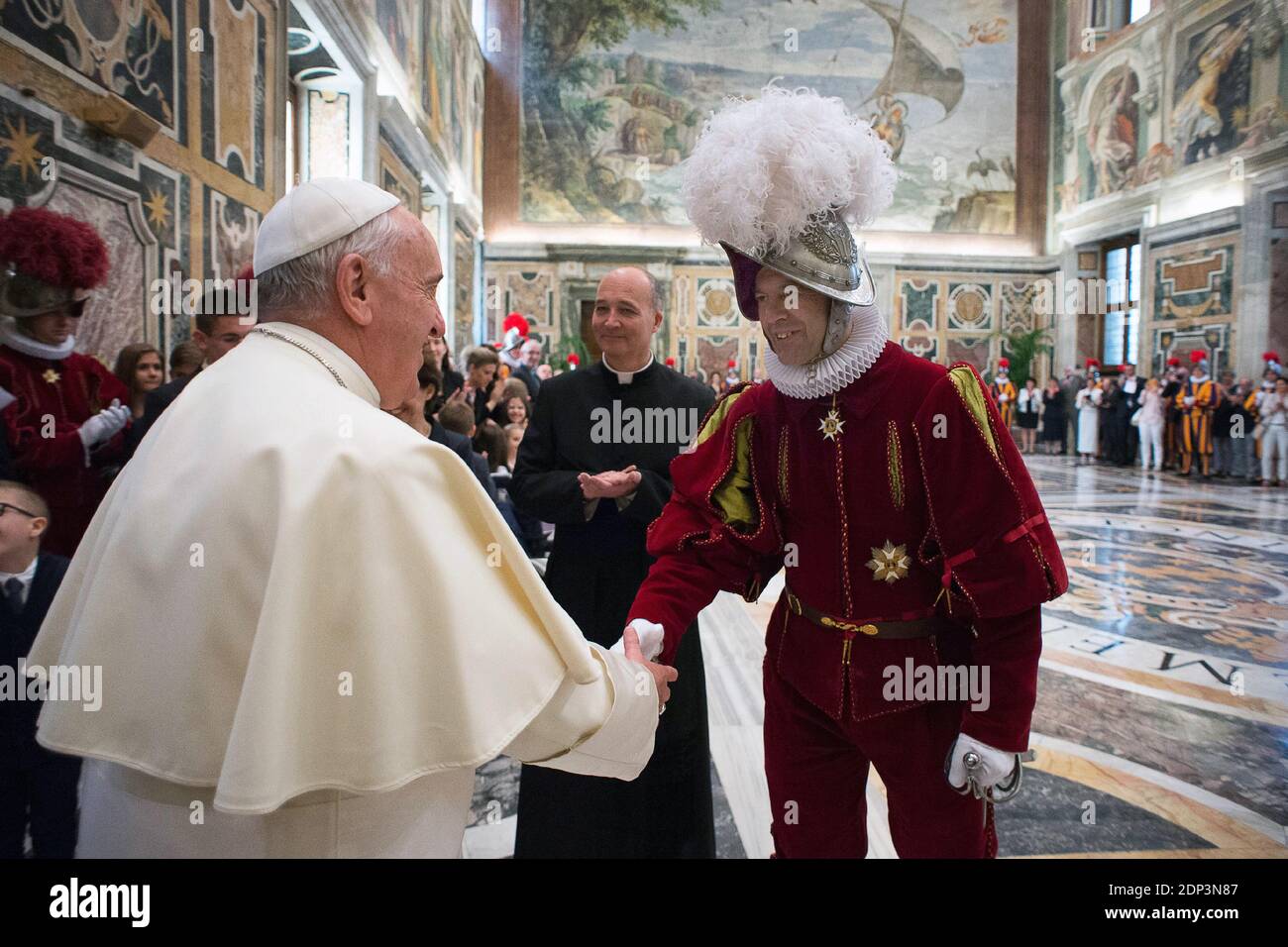 Pope Francis shakes hands with Swiss Guard commander Lt. Col. Christoph ...