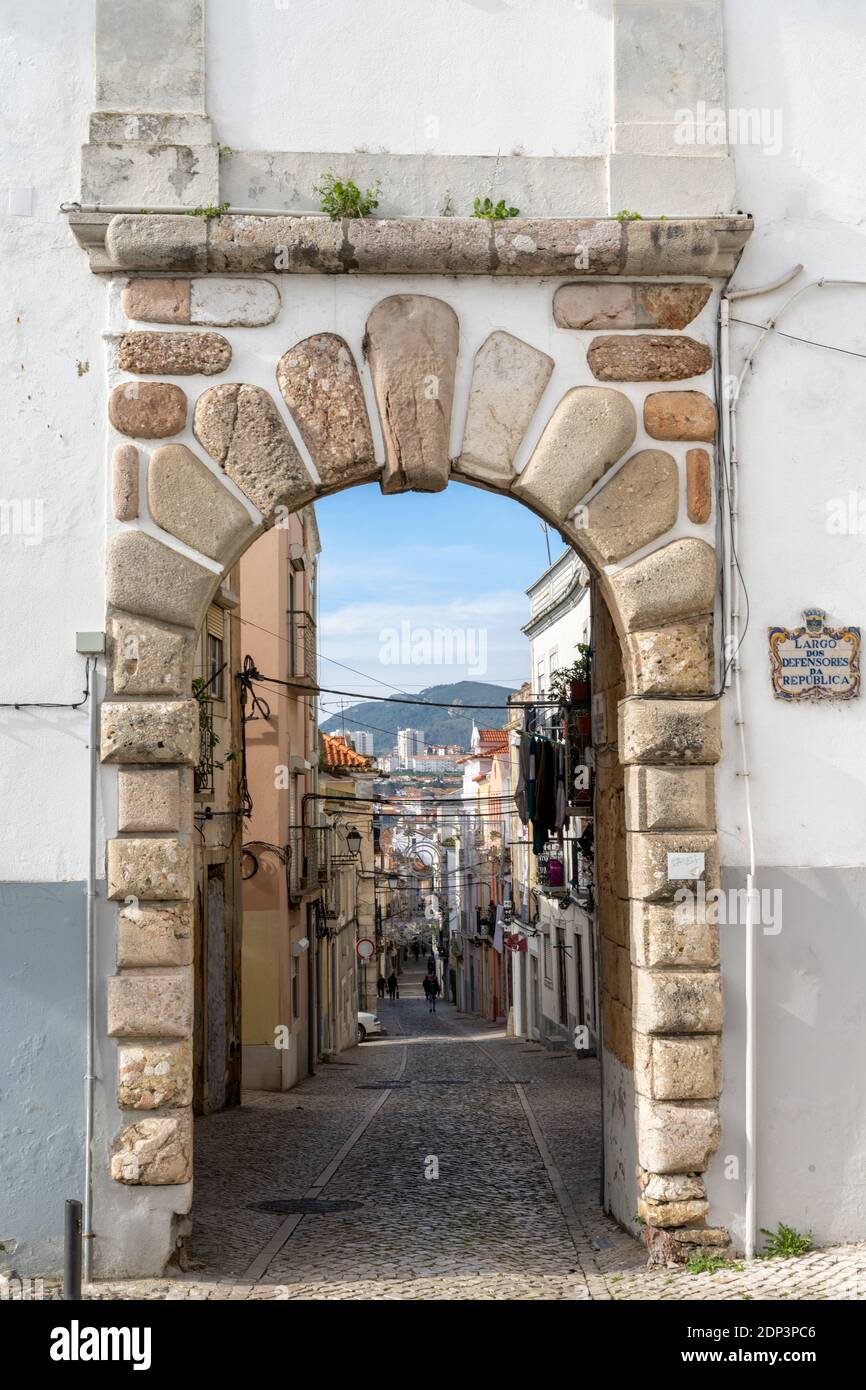 Setubal, Portugal - 18 December 2020:the old city gate leading into the ...