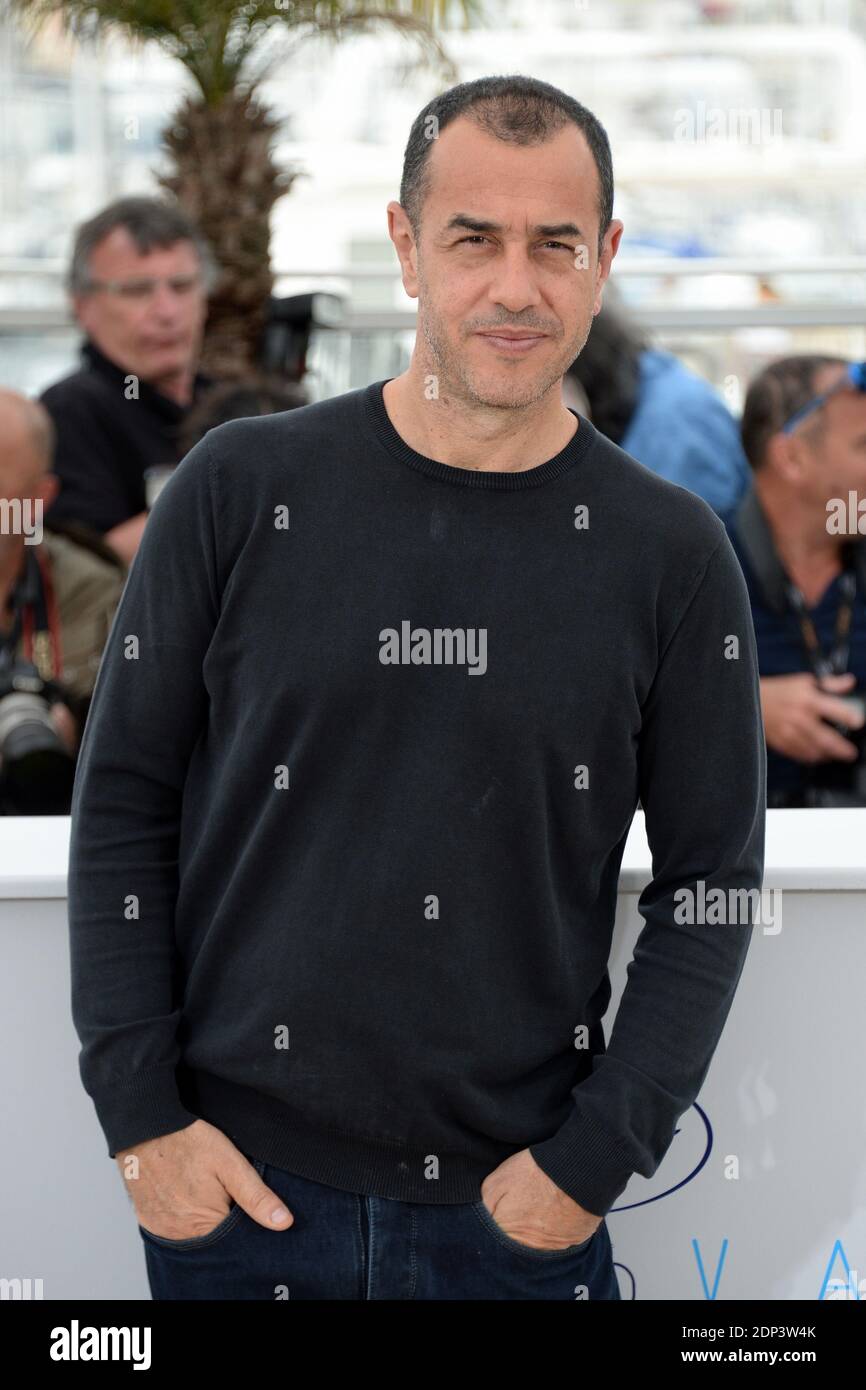 Matteo Garrone posing at the photocall for the film Tale of Tales as ...