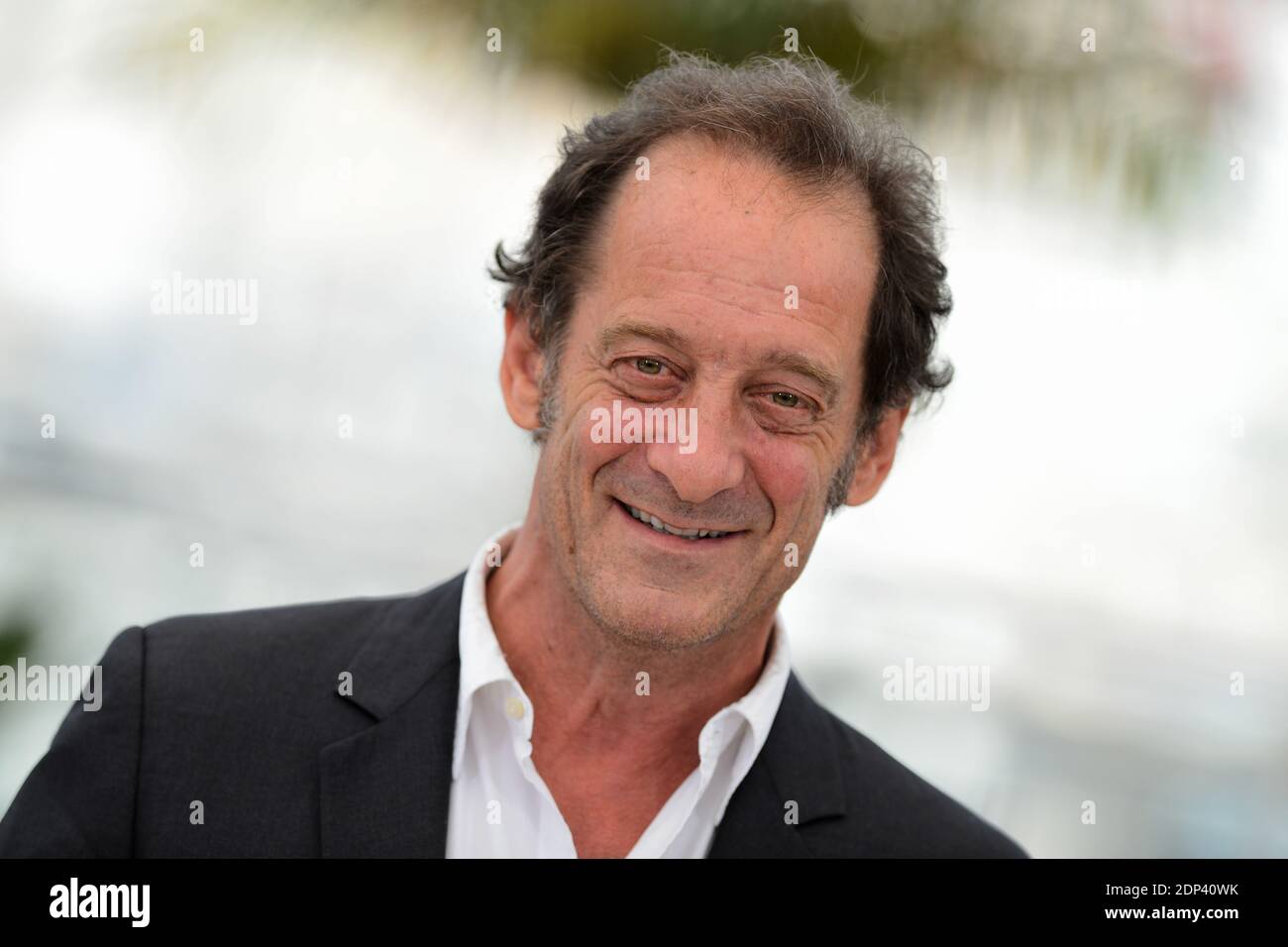 Vincent Lindon posing at the photocall for the film The Measure of a ...