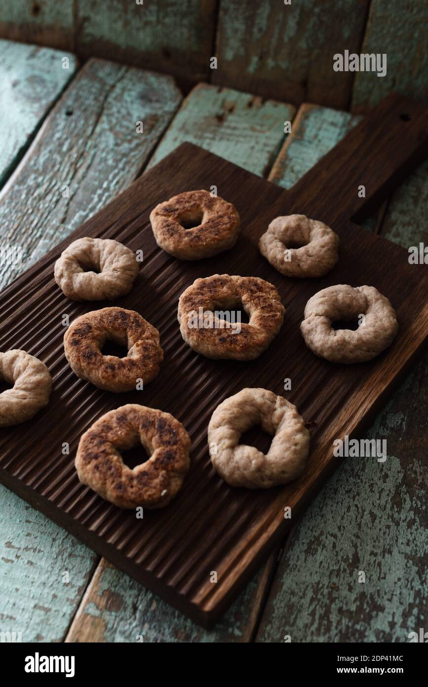Homemade healthy low sugar sweets. Small wholewheat cookies on oak ...