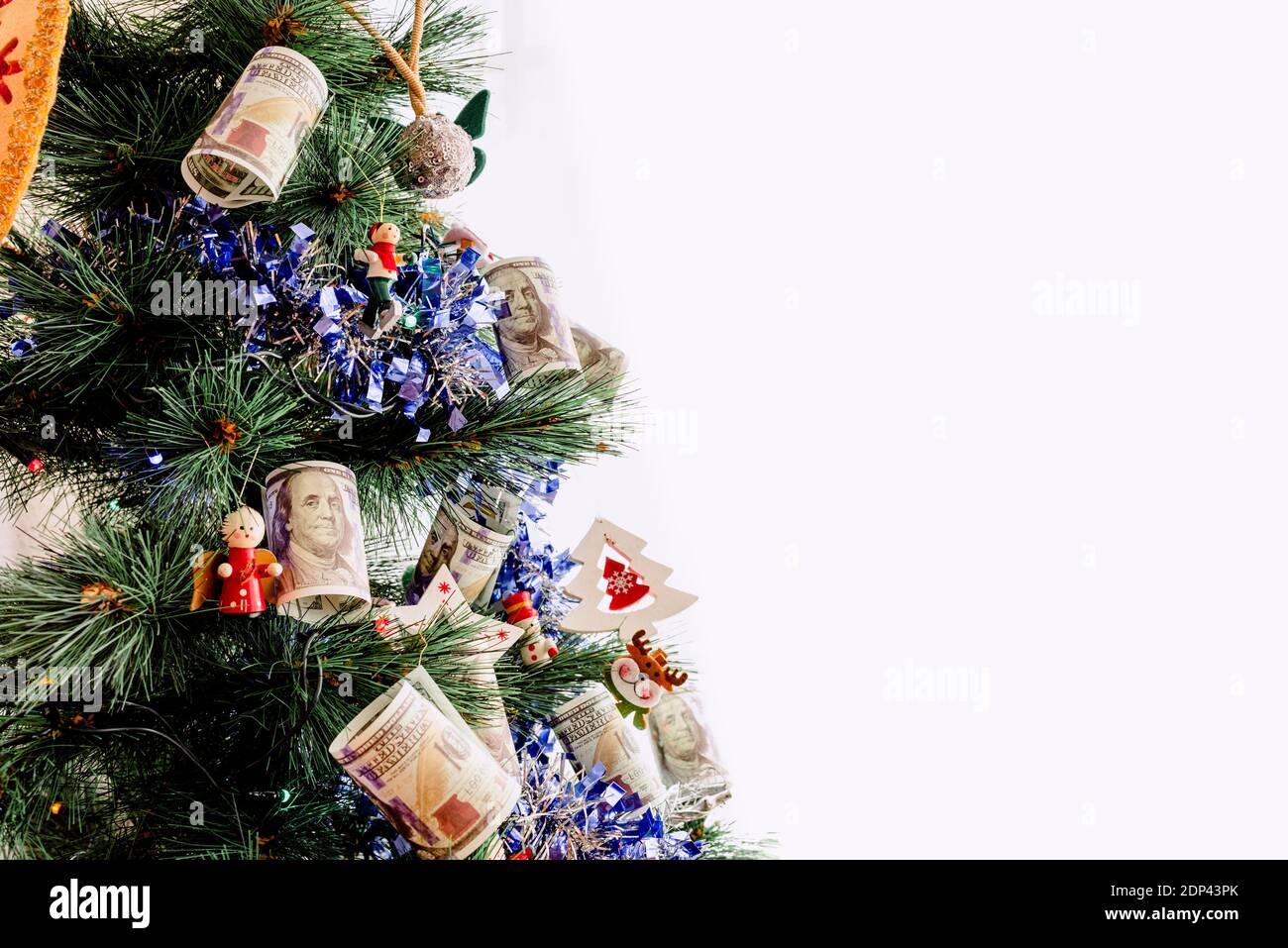 Christmas tree of wealth, with American money bills and wishes of ...