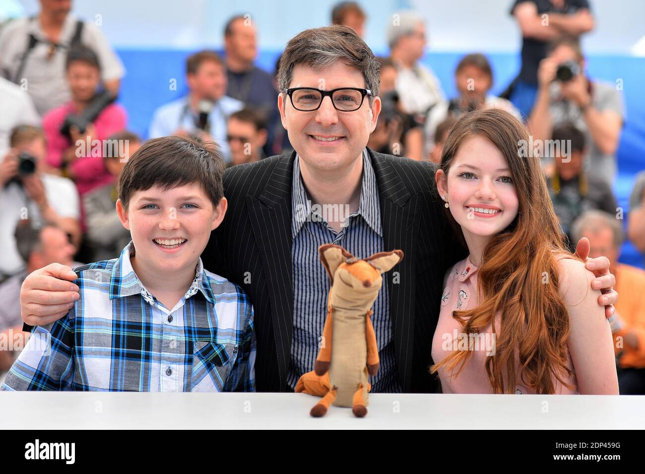 Riley Osborne, Mark Osborne and Mackenzie Foy posing at the photocall ...